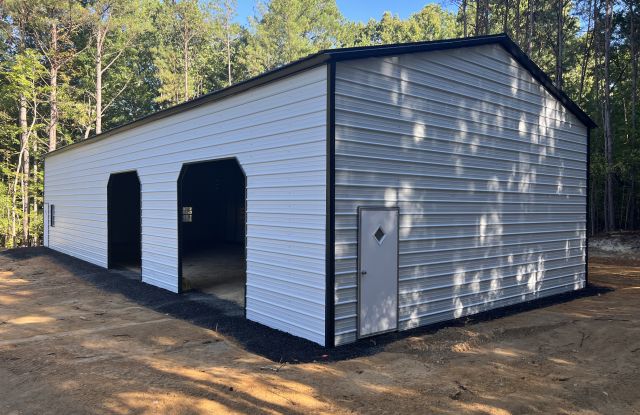 Brookstone Buildings - Fully Enclosed Two Bay Garage 30' x 26' x 12'